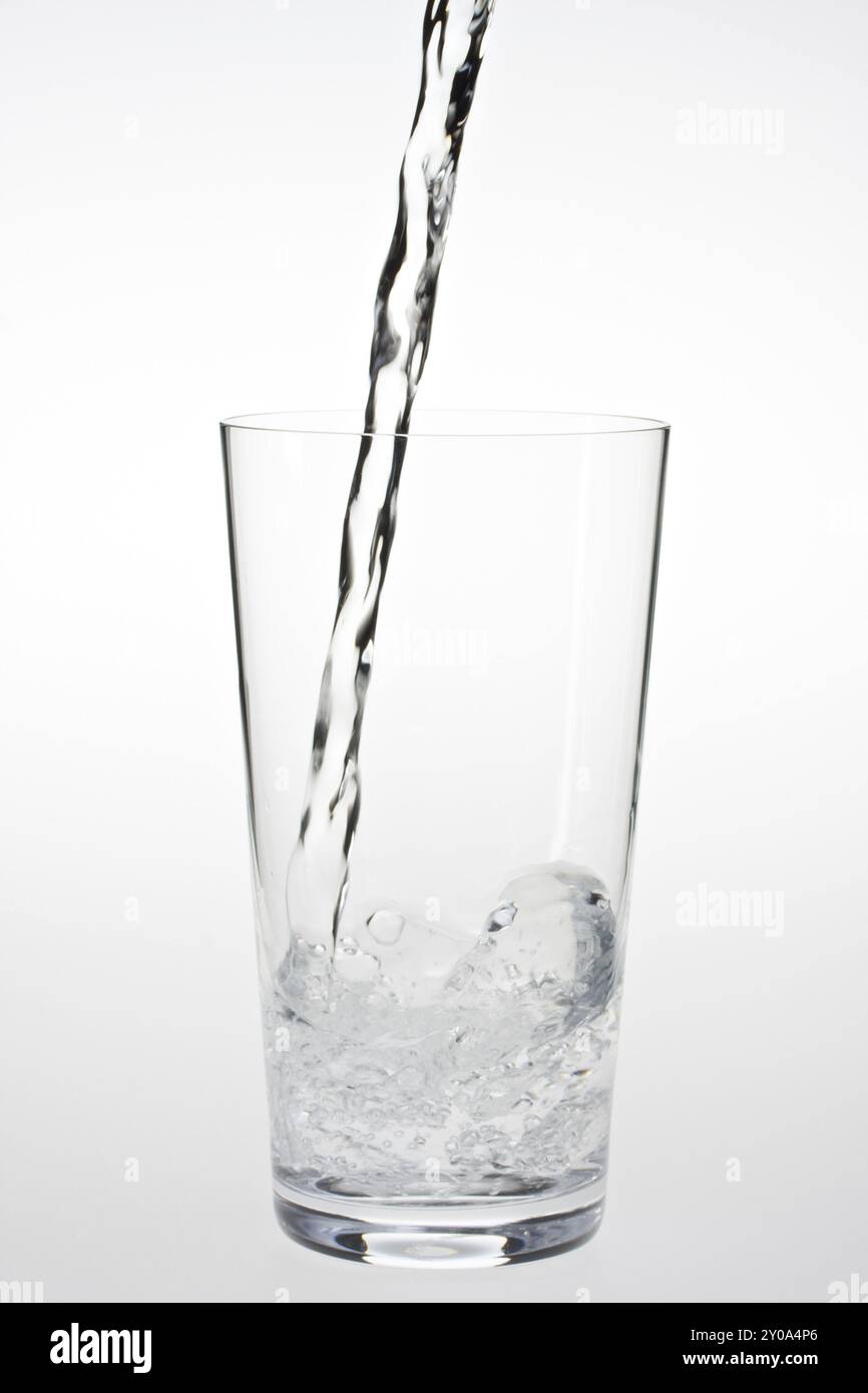 Water splashing in a drinking glass Stock Photo - Alamy
