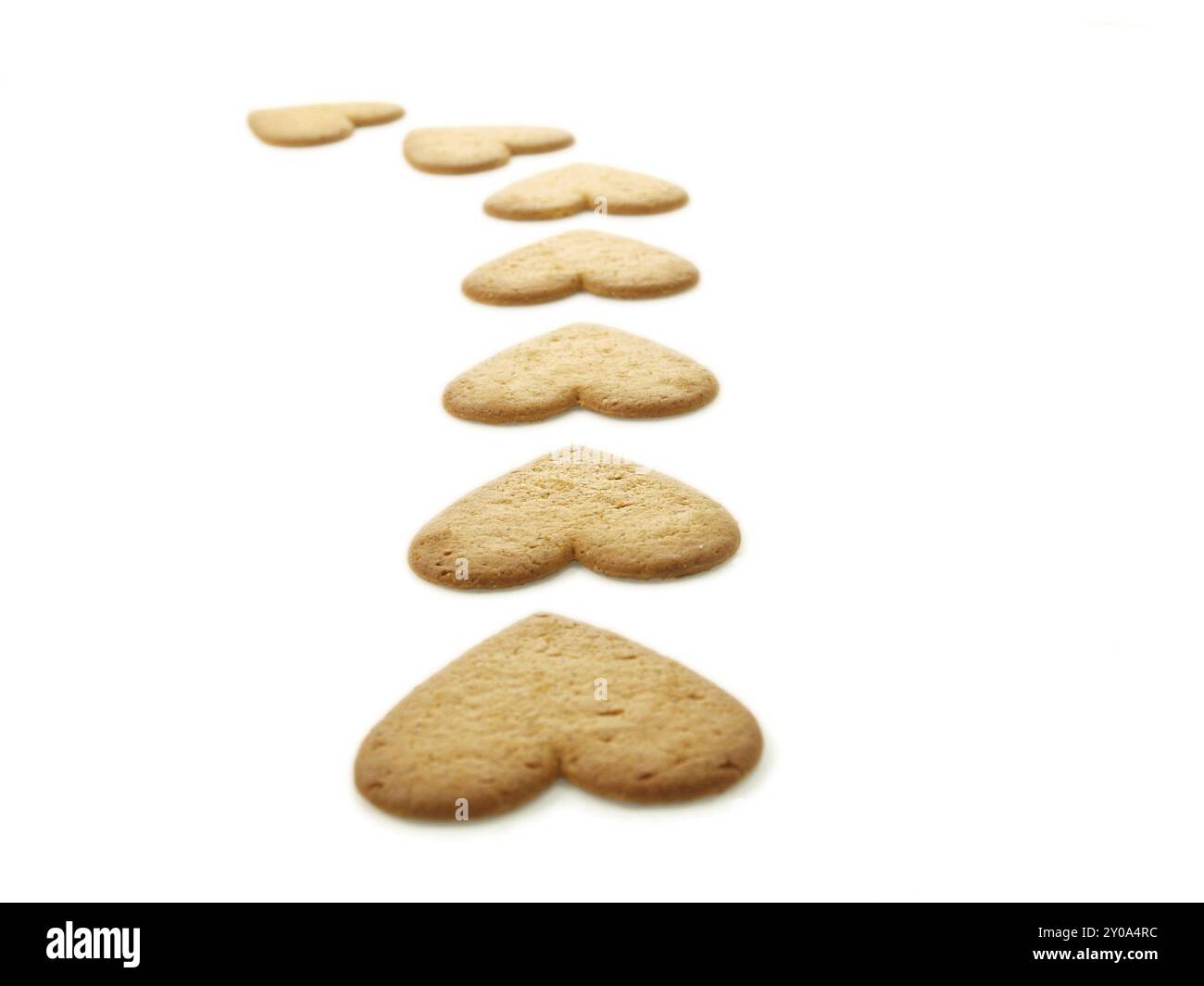 Heart shaped gingerbread, white background Stock Photo - Alamy
