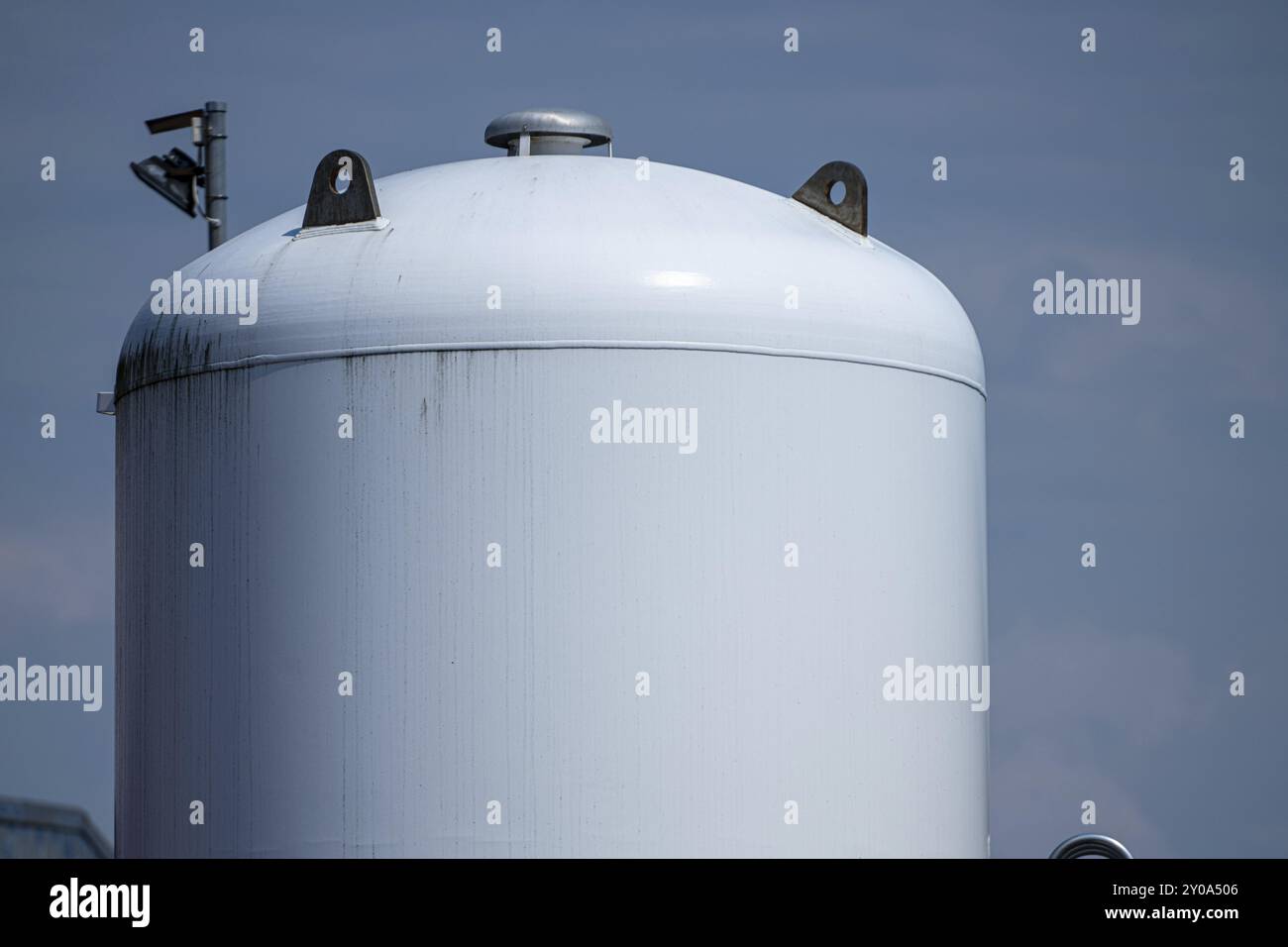 Top of large white metal gas tank Stock Photo - Alamy