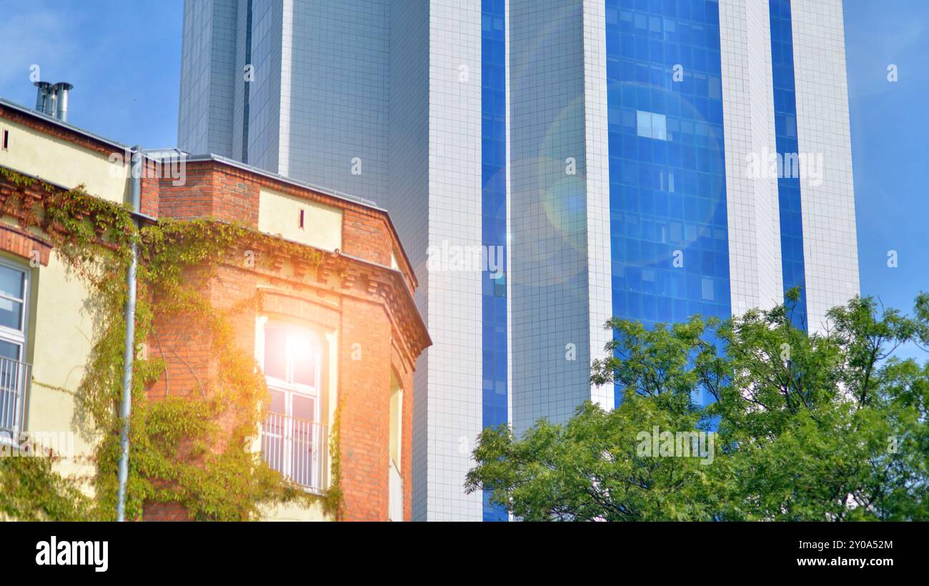Contrast of old and new buildings in downtown . An ancient building ...