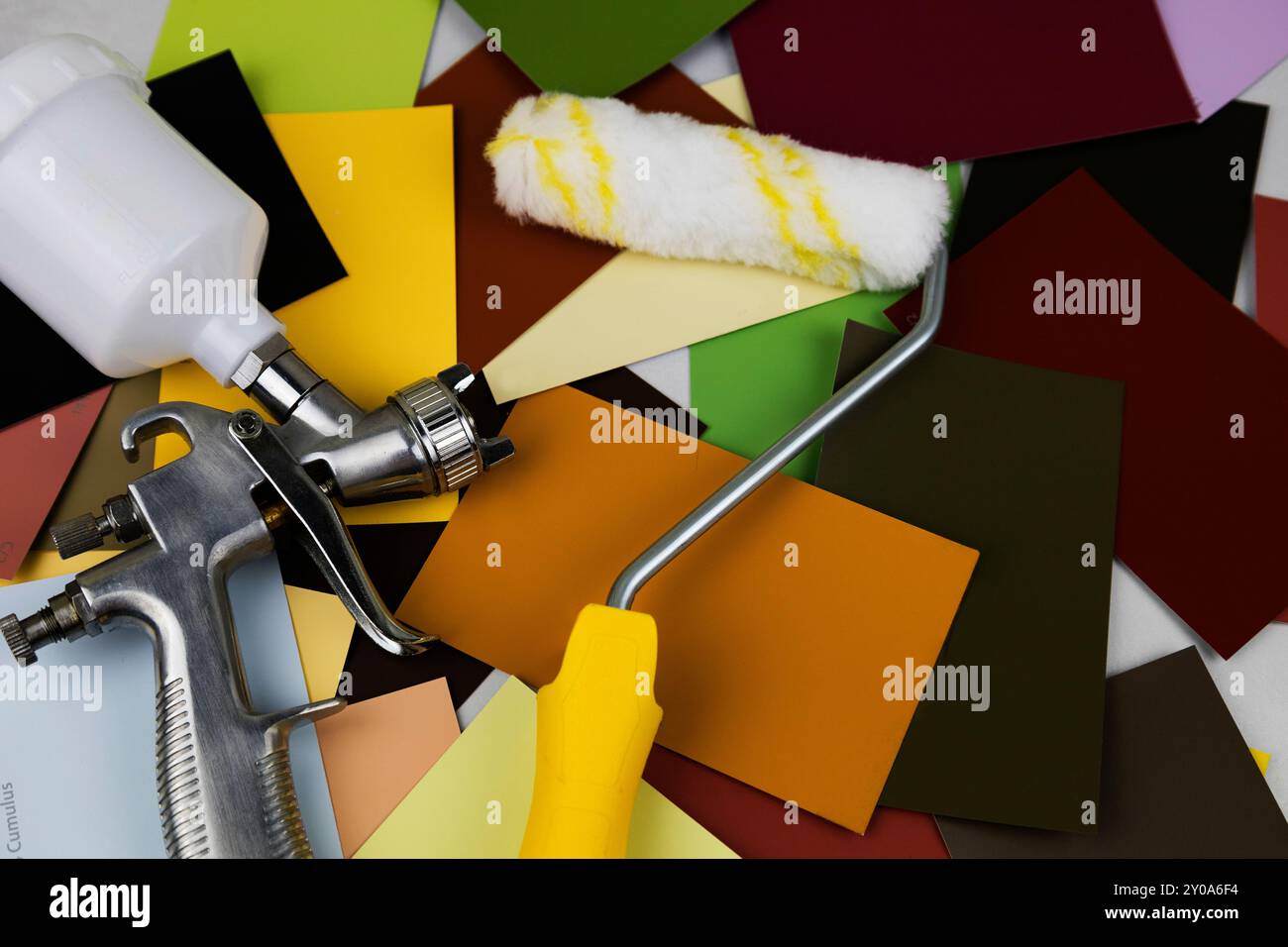 Paint spray gun at work at the workplace in the workshop. Paint Brush ...