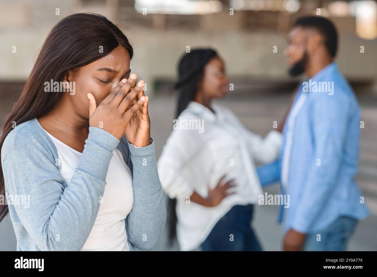 Young girl crying watching her ex boyfriend happy with another woman ...