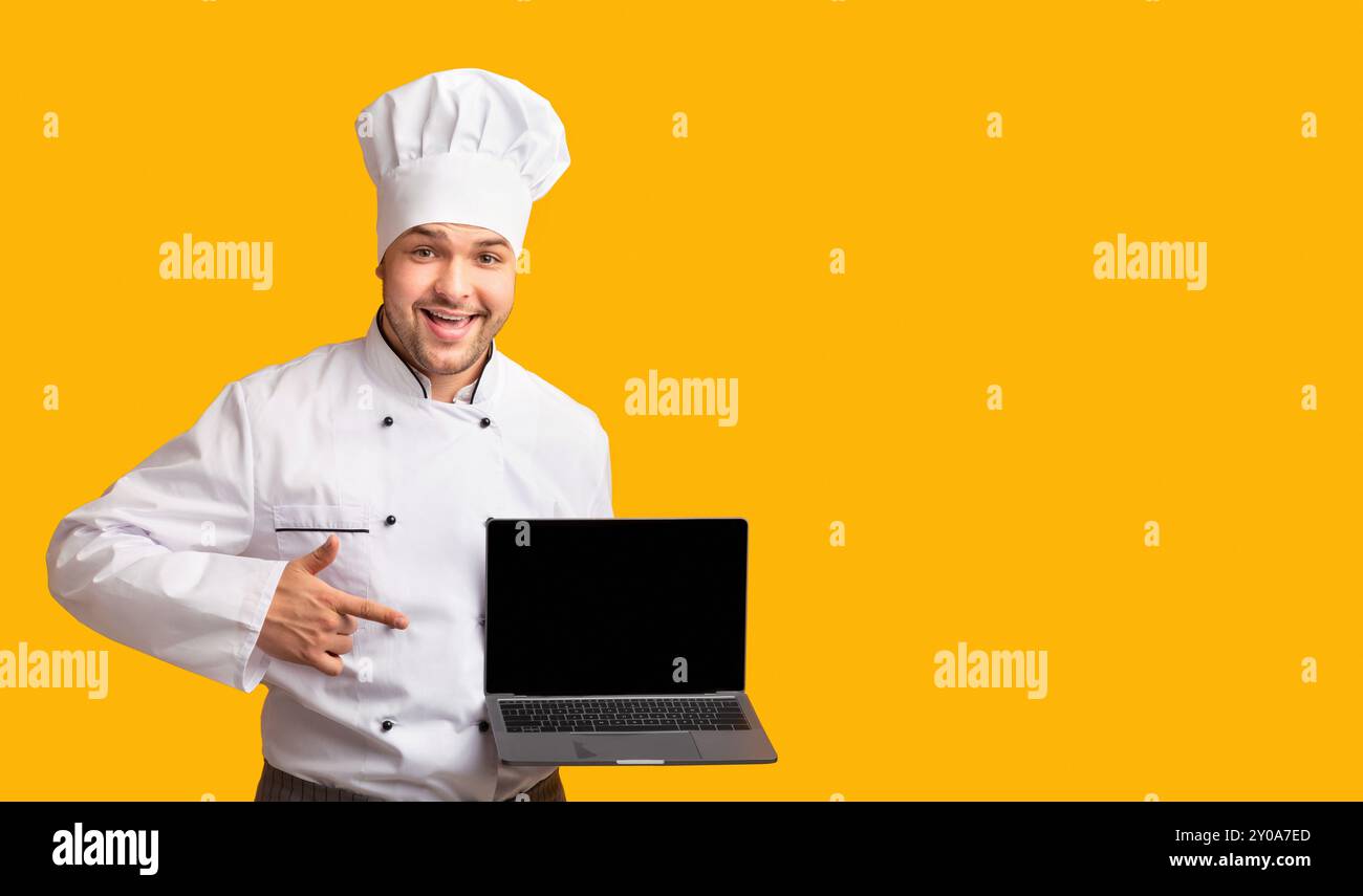Chef Showing Laptop With Empty Screen Standing, Yellow Background ...