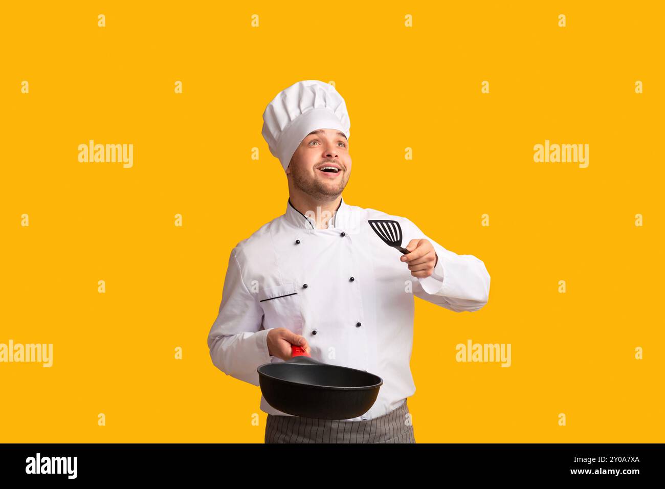 Chef Guy Holding Pan Throwing Invisible Food Standing, Studio Shot ...