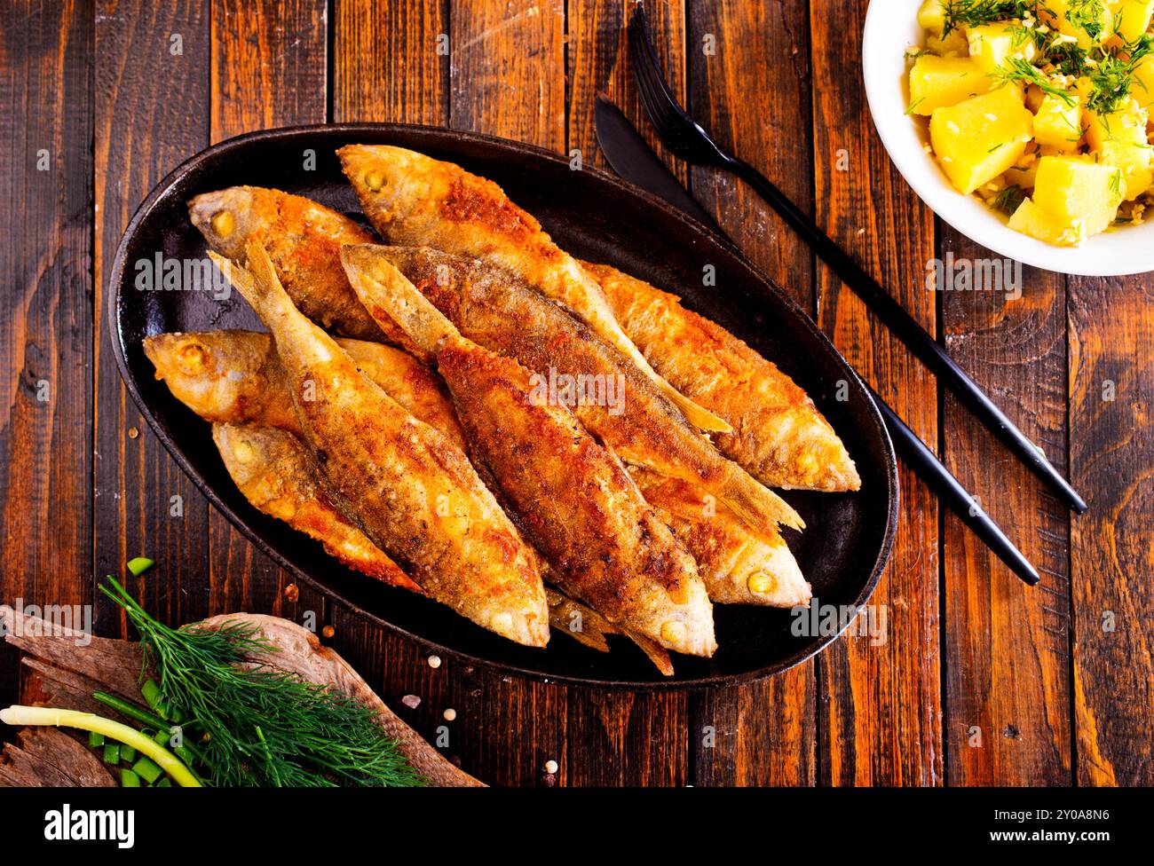 Plate of fried fish, fried fish with salt and spice Stock Photo - Alamy
