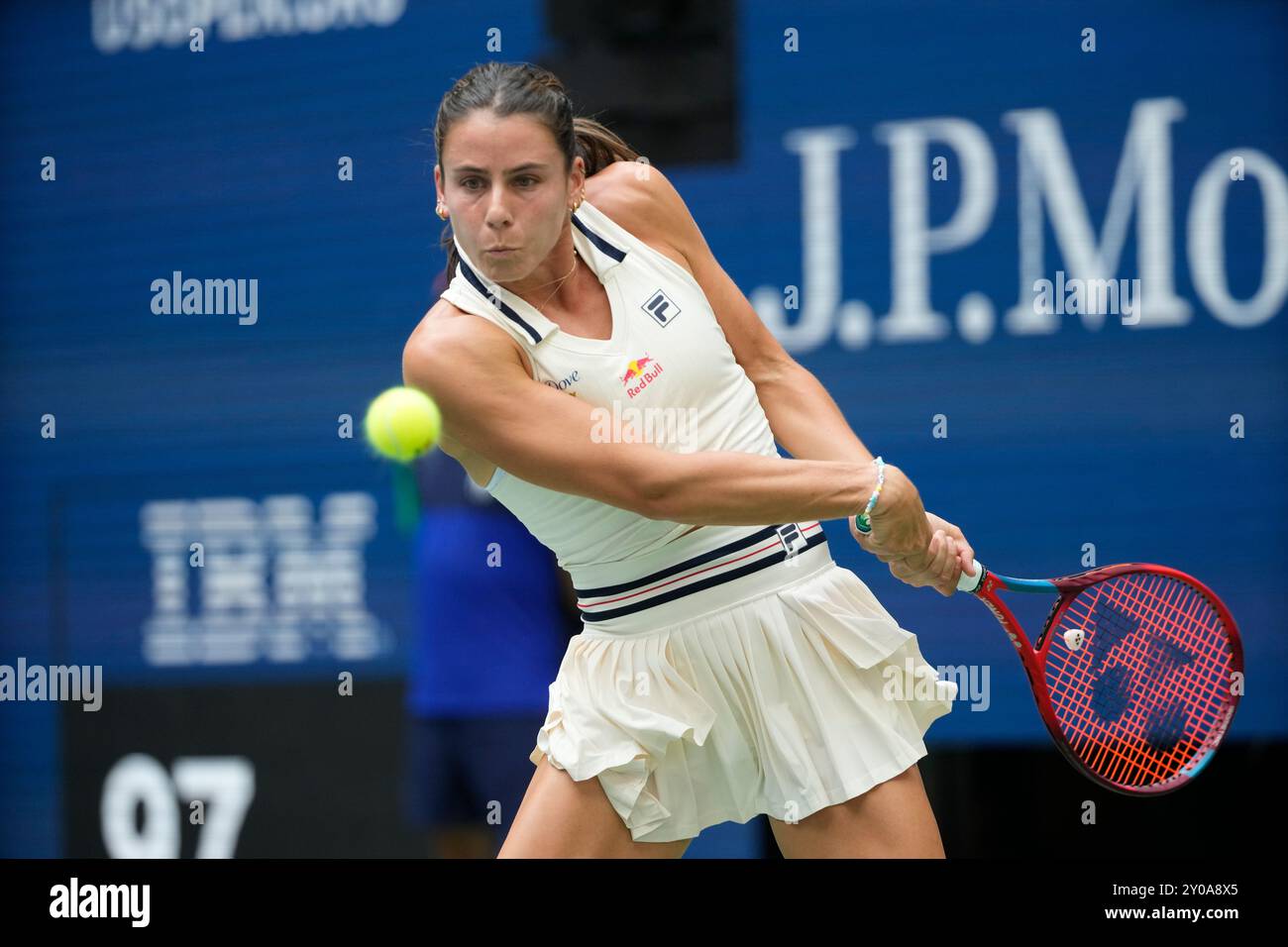 Emma Navarro, of the United States, returns a shot to Coco Gauff, of ...