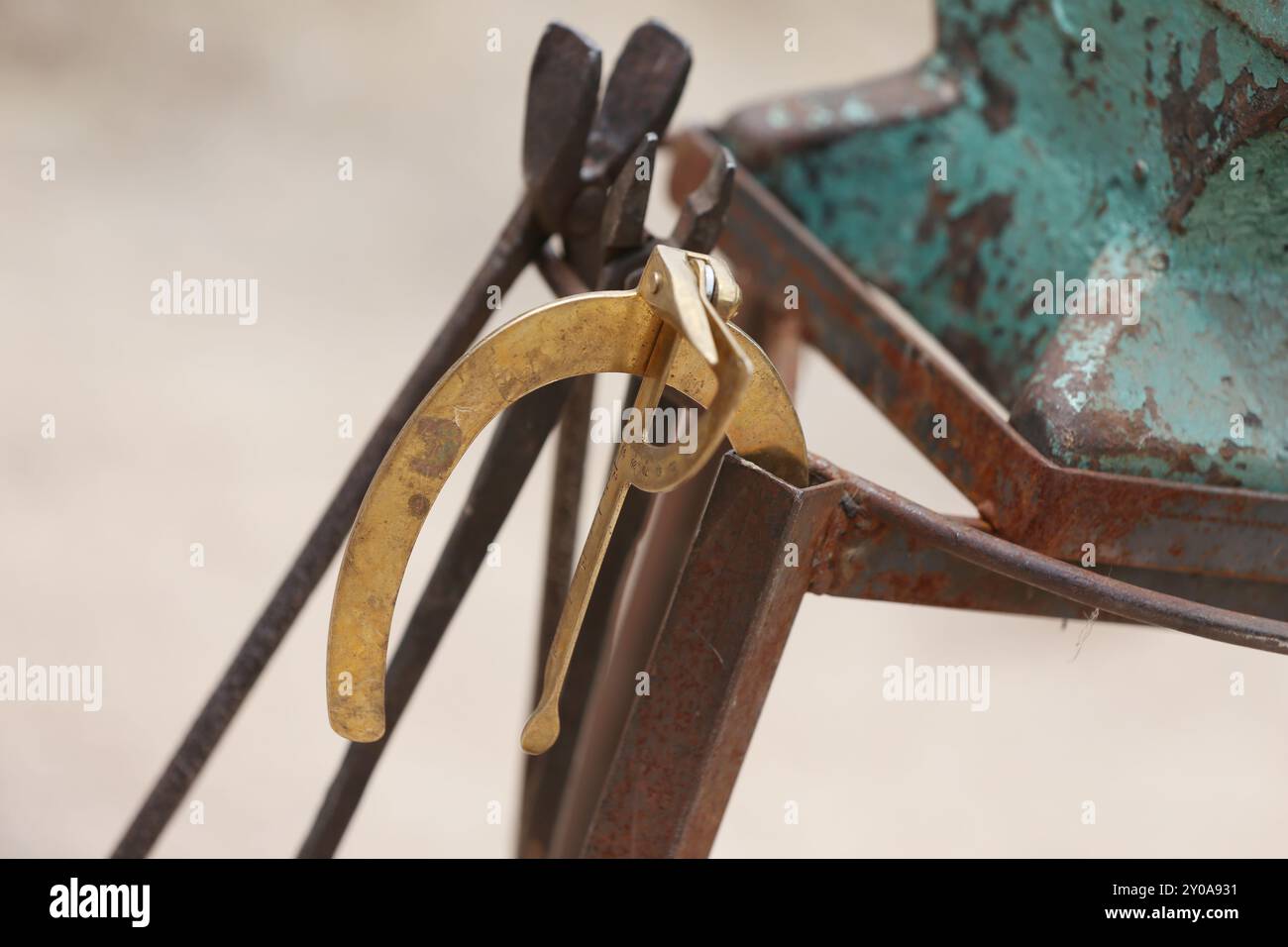Farrier tools close up view at rural horse farm. Equestrian background ...