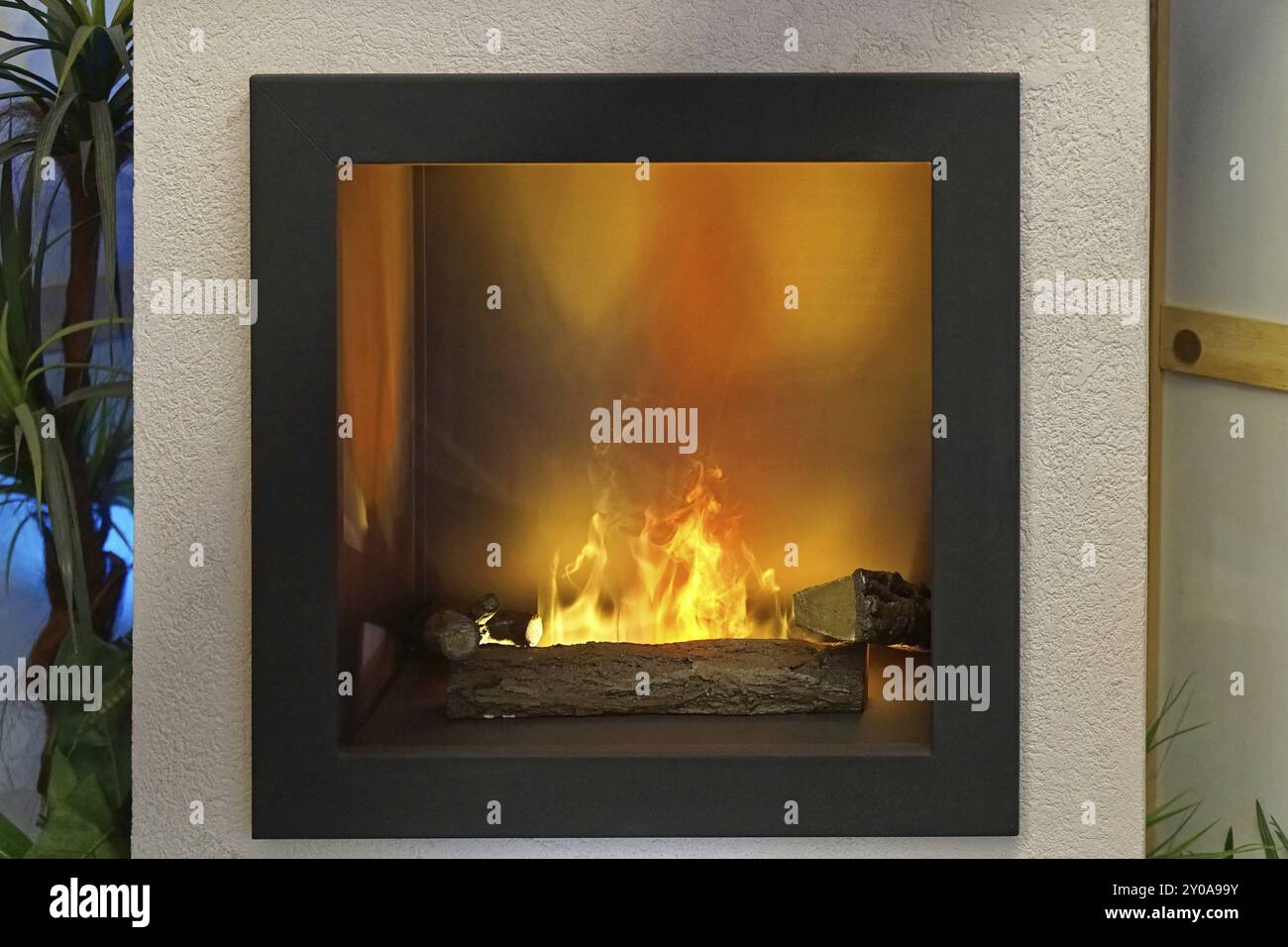 Modern square electric fireplace with led lights Stock Photo - Alamy