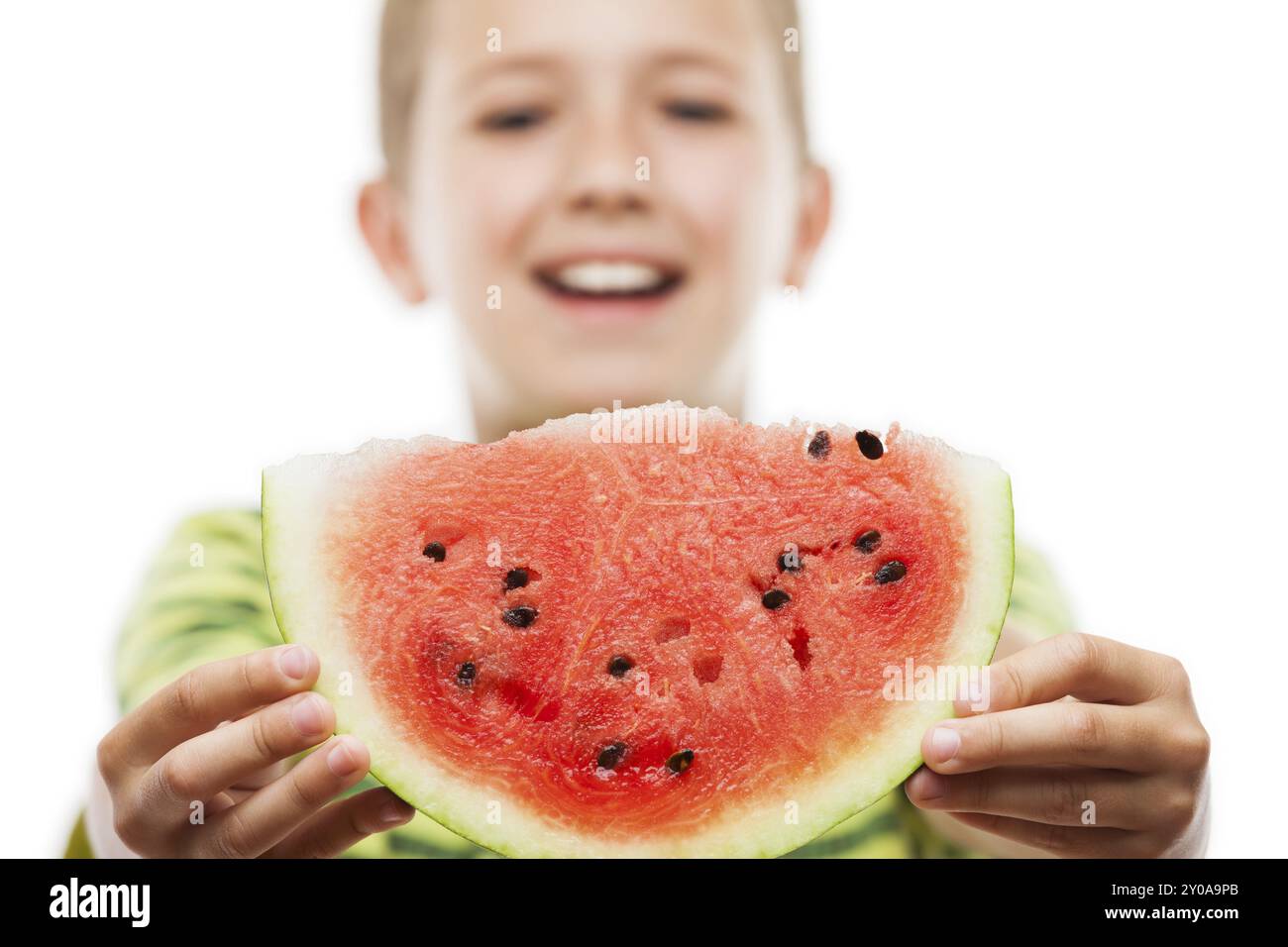 Handsome smiling child boy hand holding red ripe watermelon fruit food ...