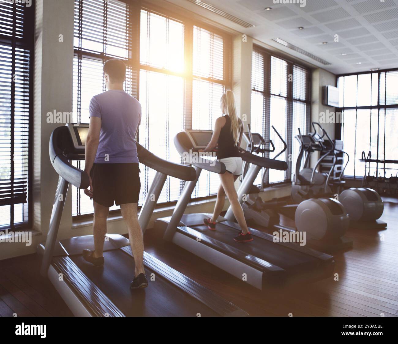 Woman walks on treadmill in hi-res stock photography and images - Alamy