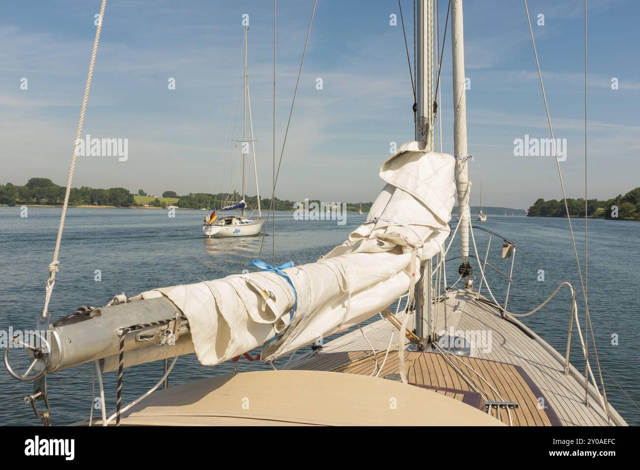 Sailing yacht with reefed mainsail. Shorten sail Stock Photo - Alamy