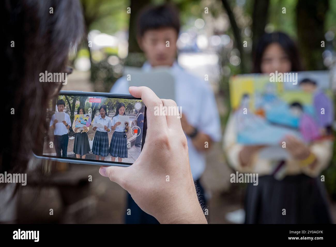 Street performance, students explain to passers-by the story of Sadako ...