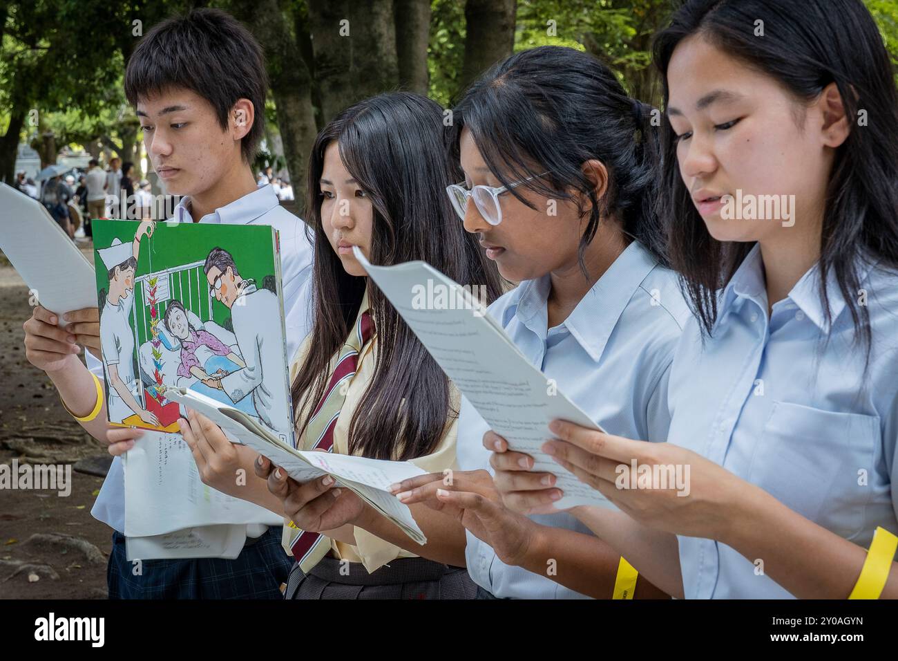 Street performance, students explain to passers-by the story of Sadako ...