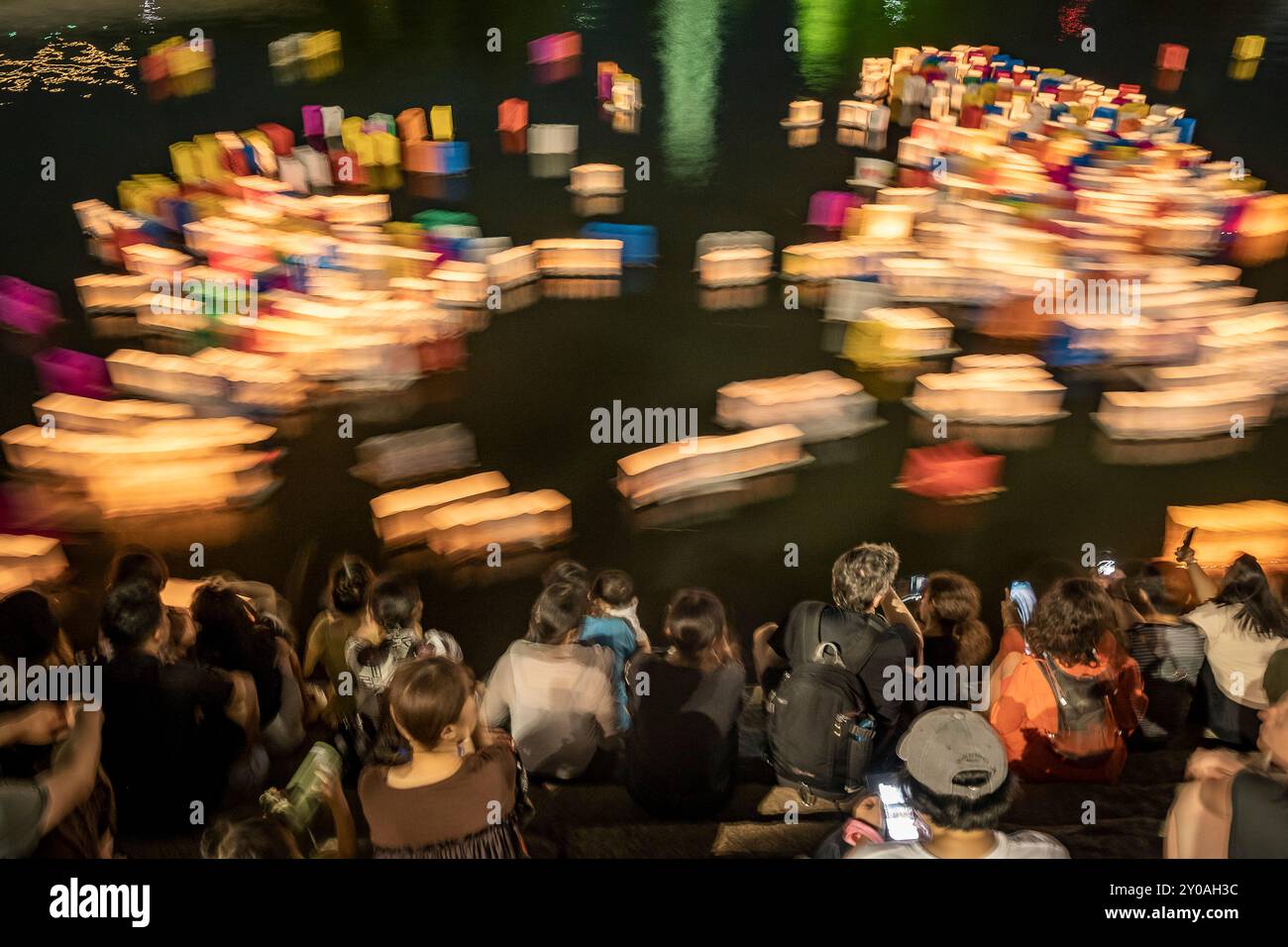 Lanterns on the river, in front of Atomic Bomb Dome with floating lamps ...