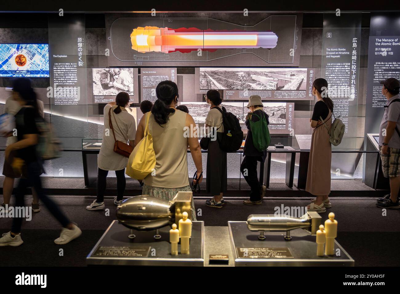 In the foreground, miniature reproductions of Fat Man and Little Boy ...