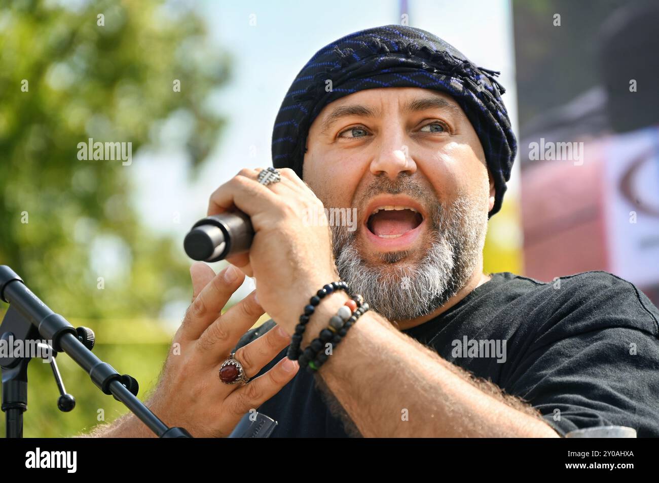 LONDON, UK. 1st Sep, 2024. Speaker at The 44th Arbaeen Procession UK of ...