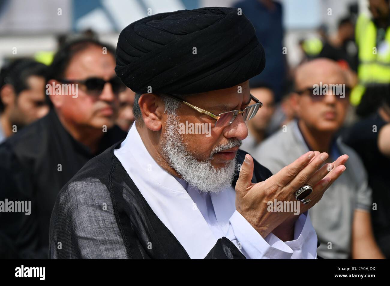 LONDON, UK. 1st Sep, 2024. Maulana Syed Raza Haider Rizvi giving a pray ...