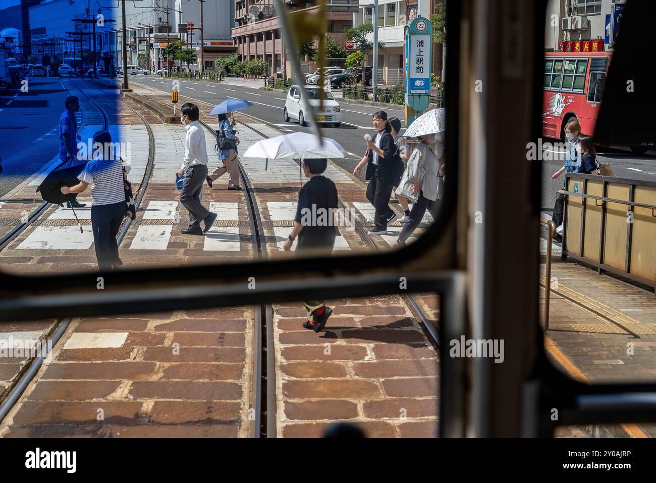New Urakami Rd from the window of tram number 3. The trams began ...