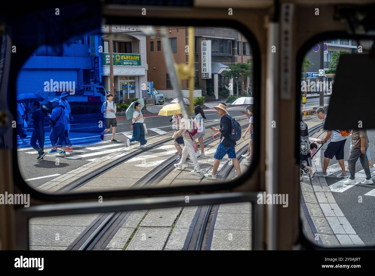 New Urakami Rd from the window of tram number 3. The trams began service in 1915 and has been ...