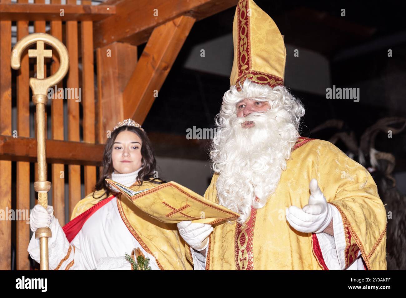 Saint Nicholas and Angel at a Christmas Event Stock Photo - Alamy