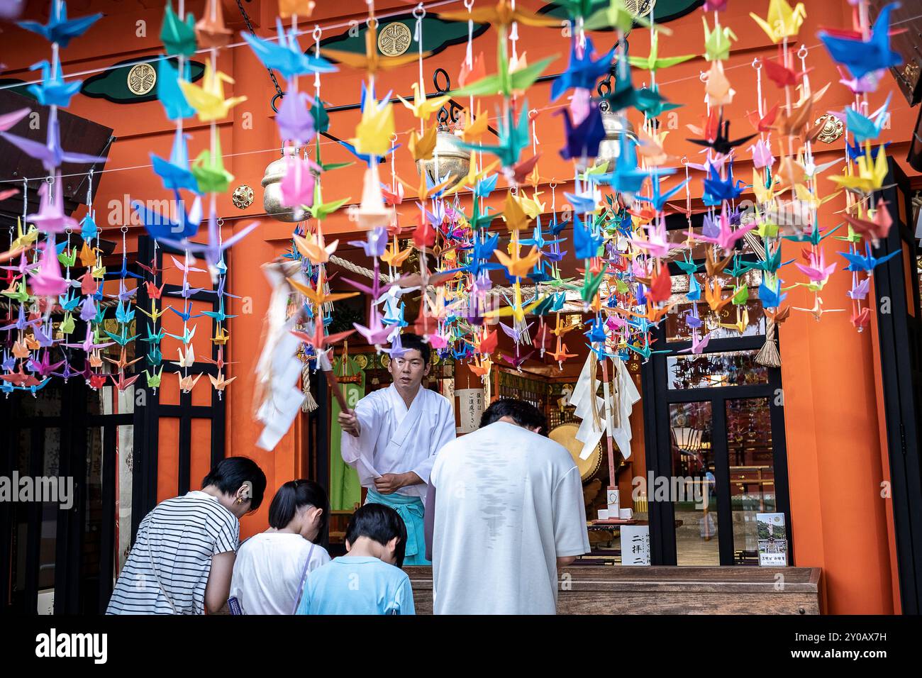 Praying for peace, in Toshogu Shrine, Hiroshima, Japan Stock Photo - Alamy