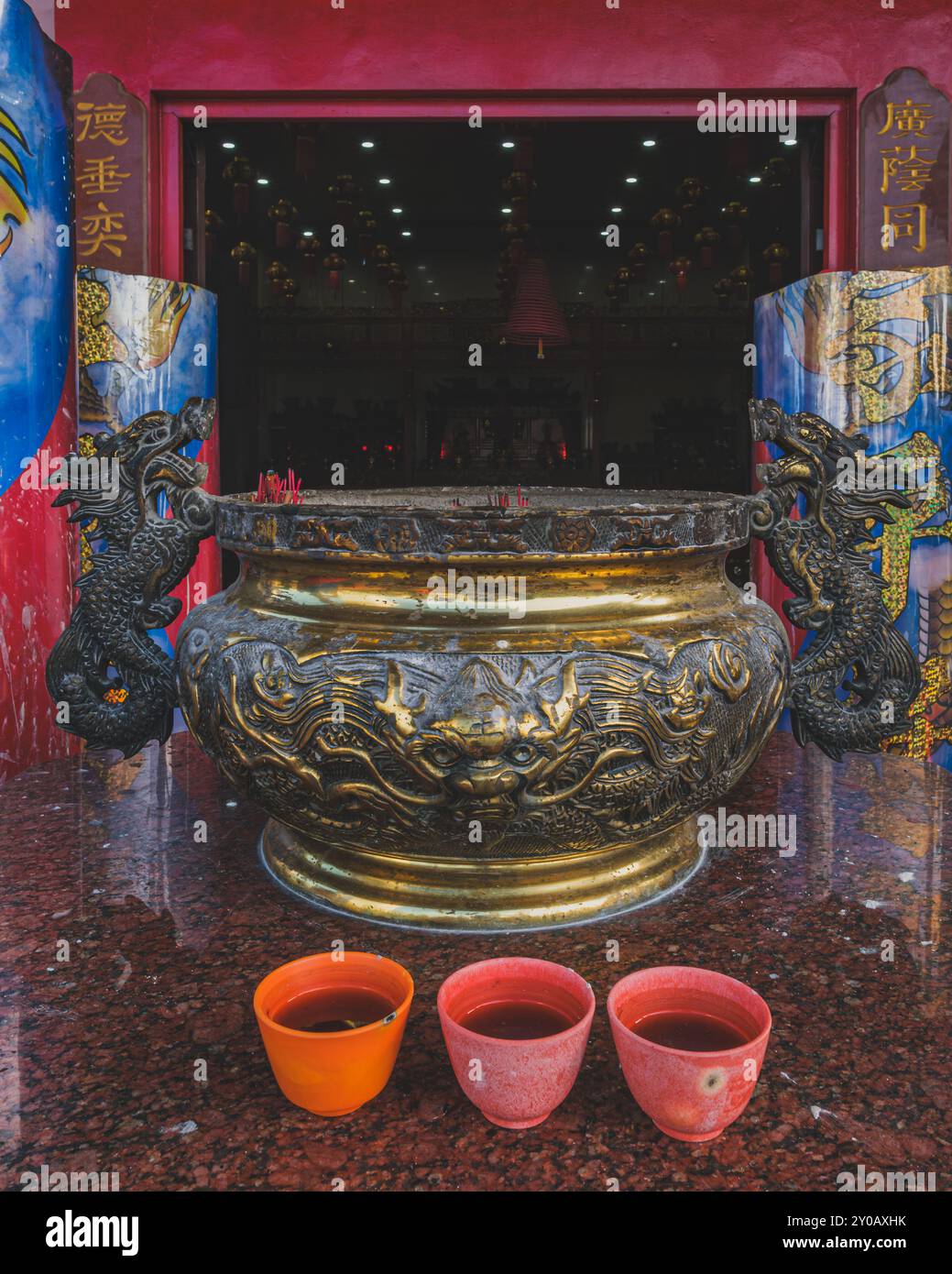 Balikpapan, Indonesia - June 22nd, 2024. A bronze incense burner with ...