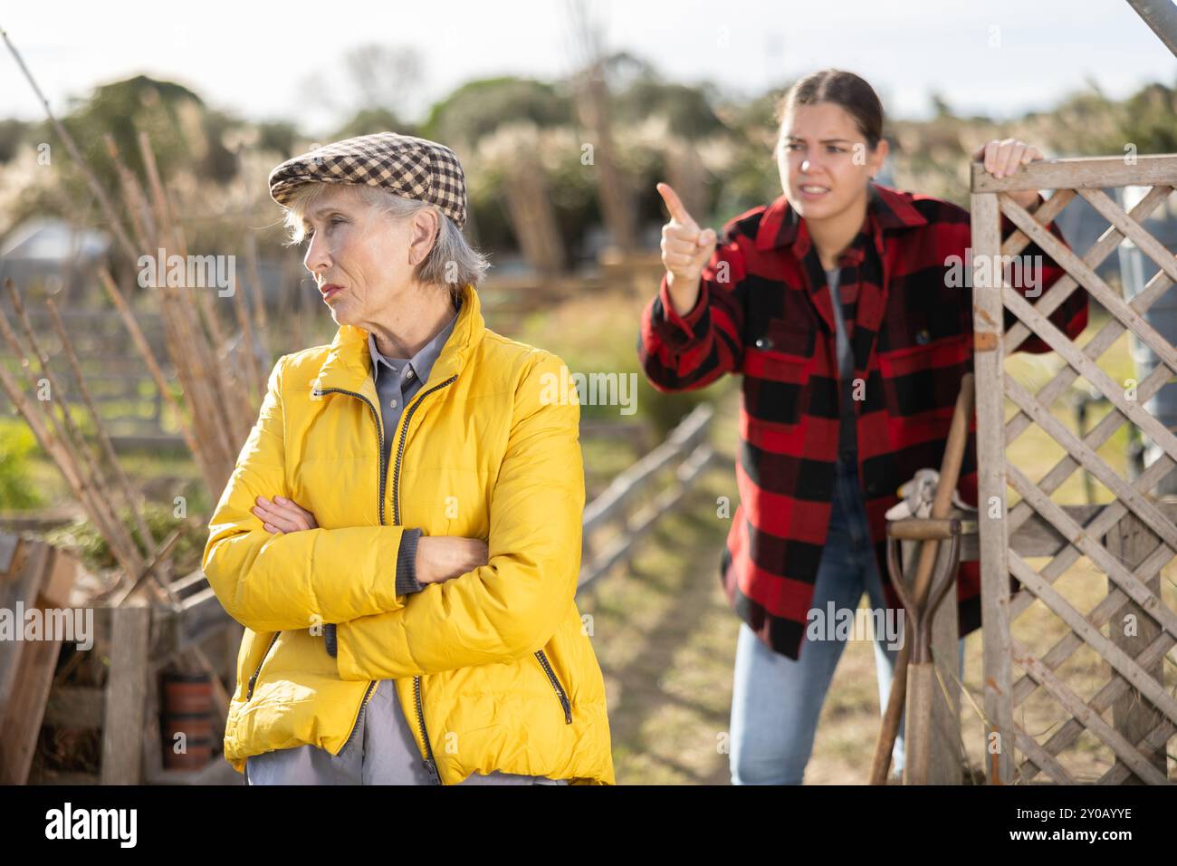 Conflict between female neighbors in country farm Stock Photo - Alamy