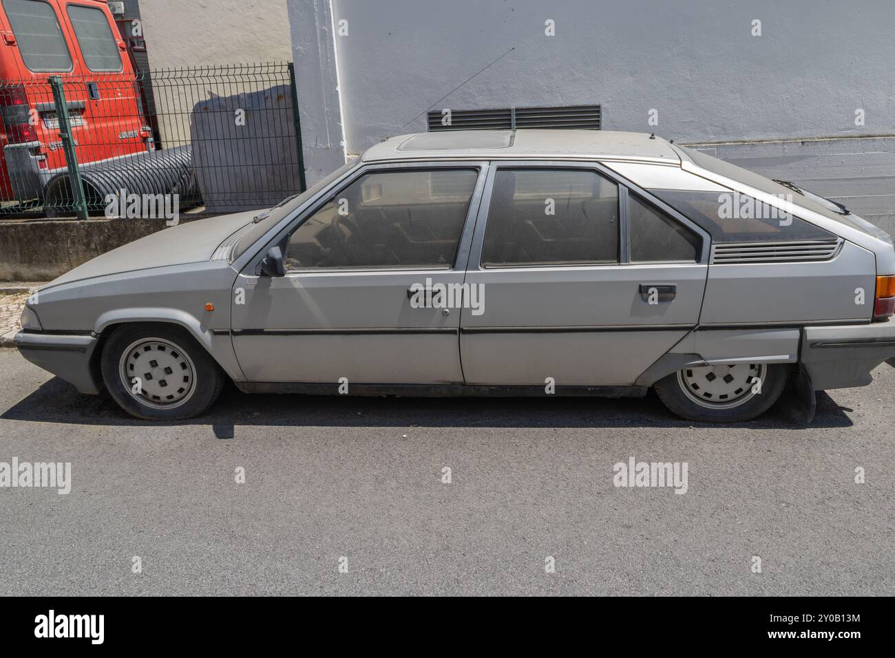 Old, grey citroen bx 16 trs car parked on the street, showing signs of ...