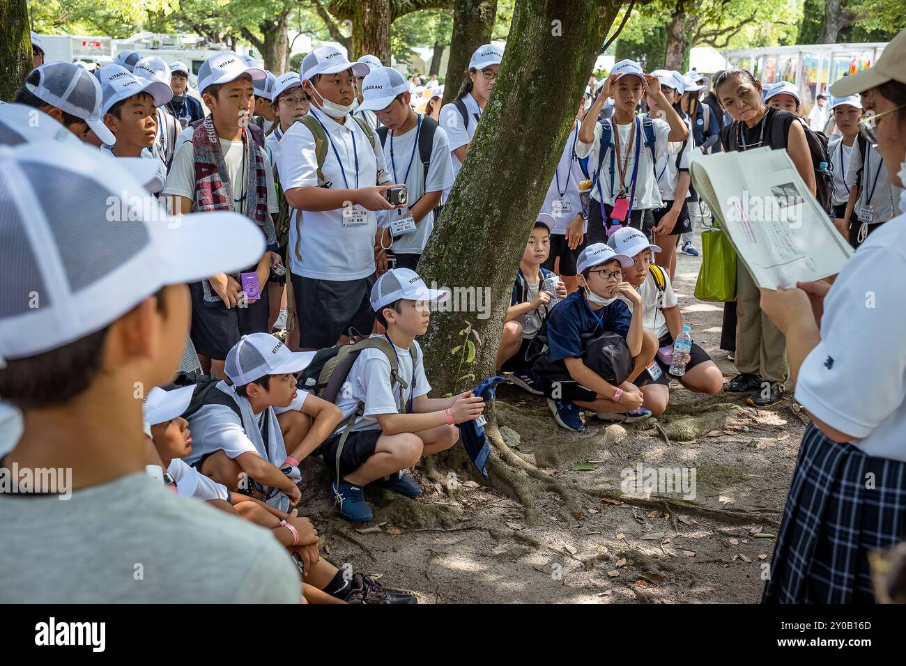 Street performance, students explain to passers-by the story of Sadako ...