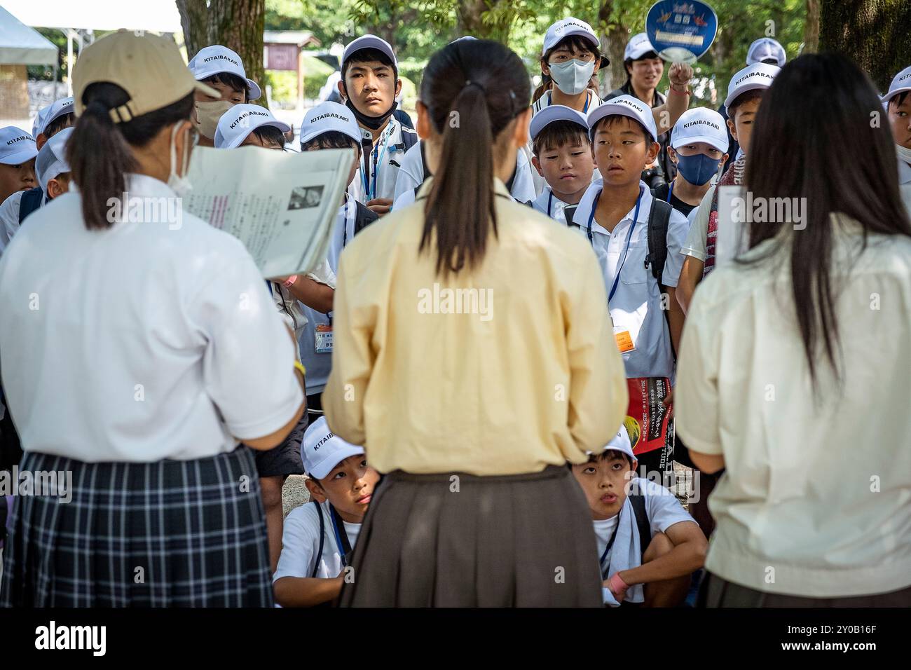 Street performance, students explain to passers-by the story of Sadako Sasaki, who turned the ...