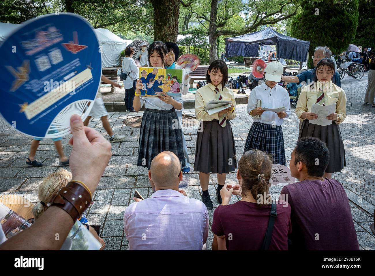Street performance, students explain to passers-by the story of Sadako ...