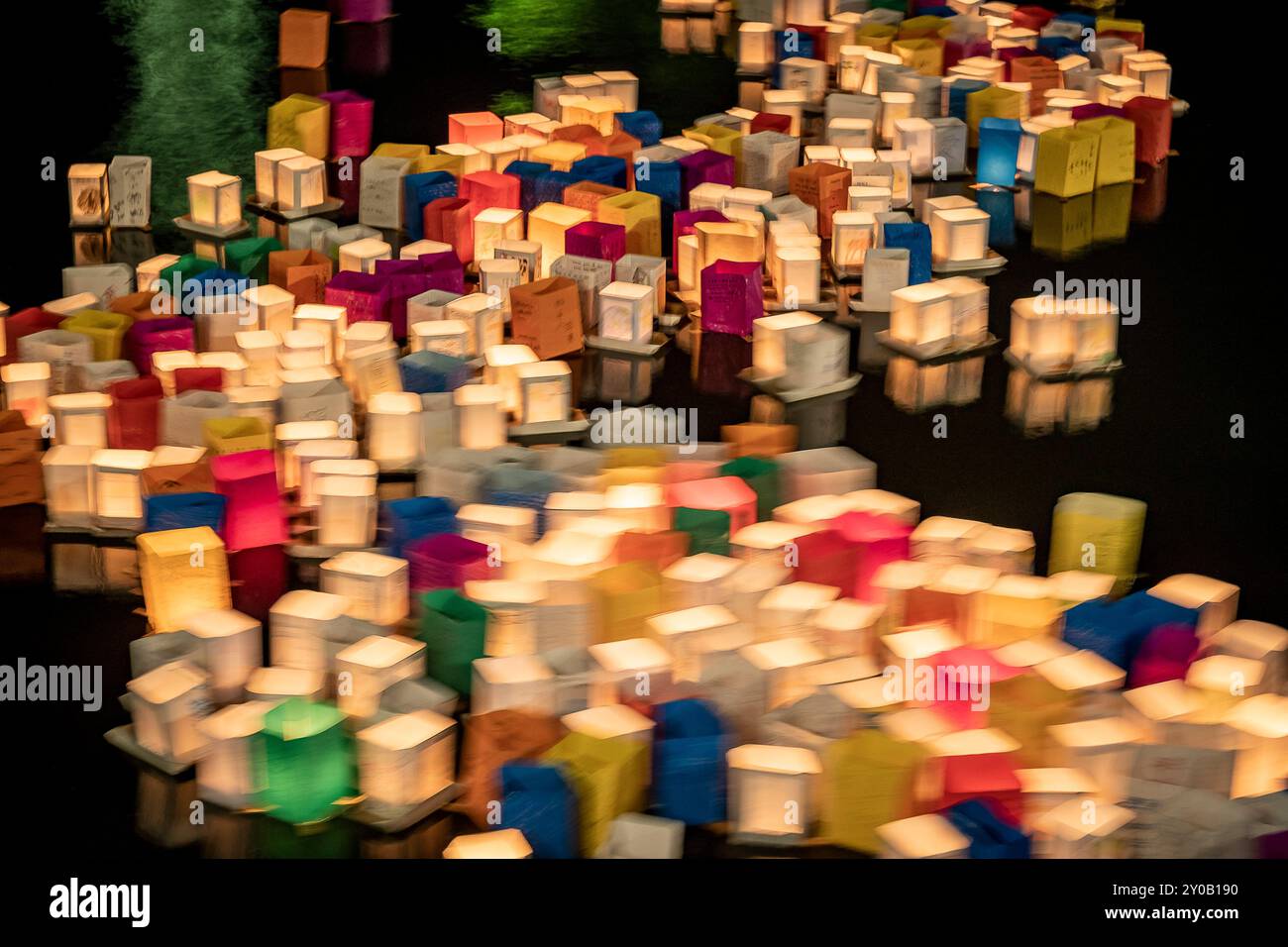 Lanterns on the river, in front of Atomic Bomb Dome with floating lamps ...