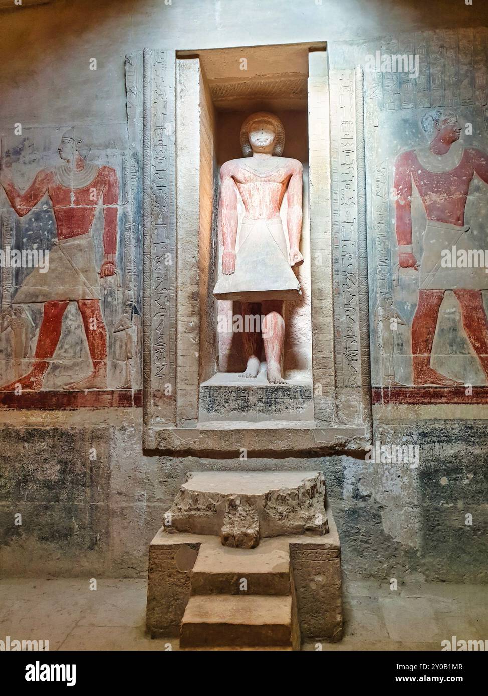 Statue of Merurka standing in a wall niche, a powerful official around ...