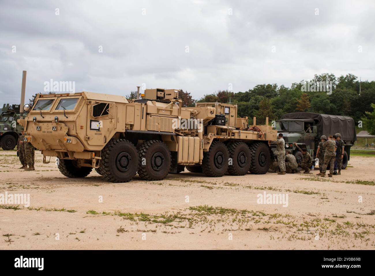 A U.S. Marine Corps AMK36 wrecker attached to Combat Logistics ...
