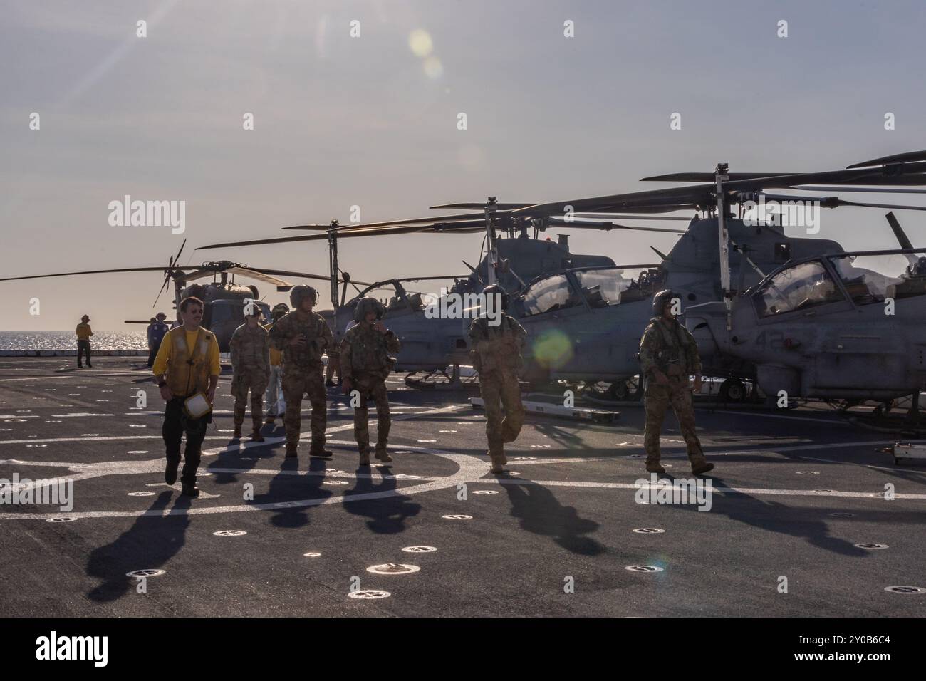 U.S. Navy Sailors with the amphibious transport dock ship USS Green Bay ...