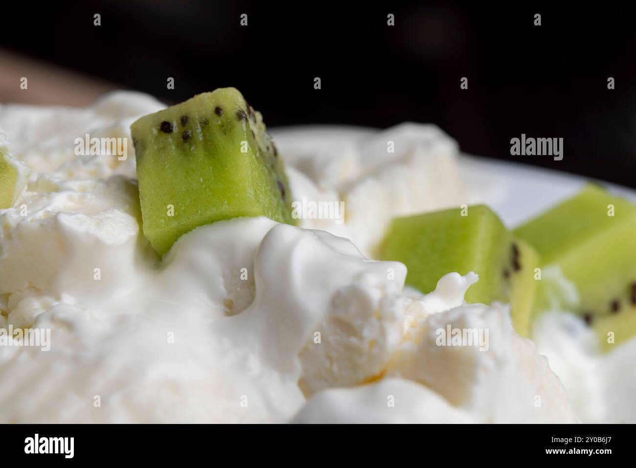 White cottage cheese with sour cream, making a dairy breakfast with ...