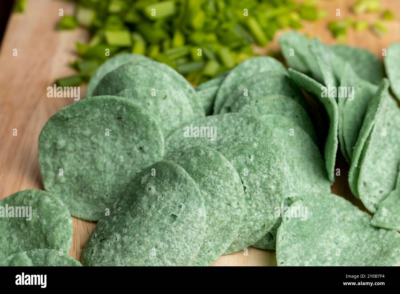 Thin and delicious green potato chips, crispy green chips with pepper ...