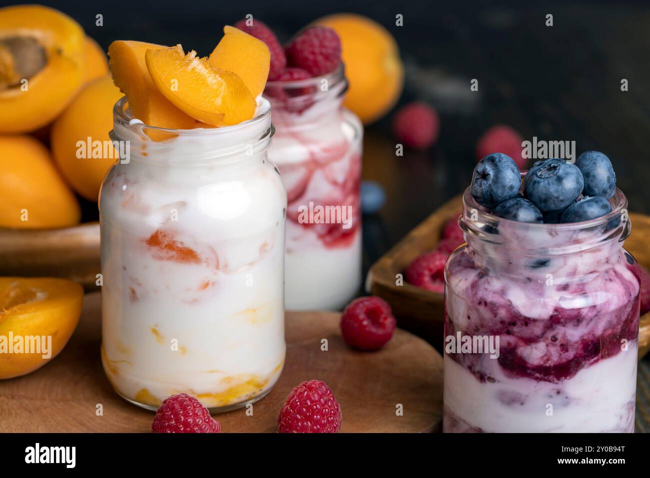 Fresh delicious milk yogurt with peach flavor, yogurt with red sweet ...
