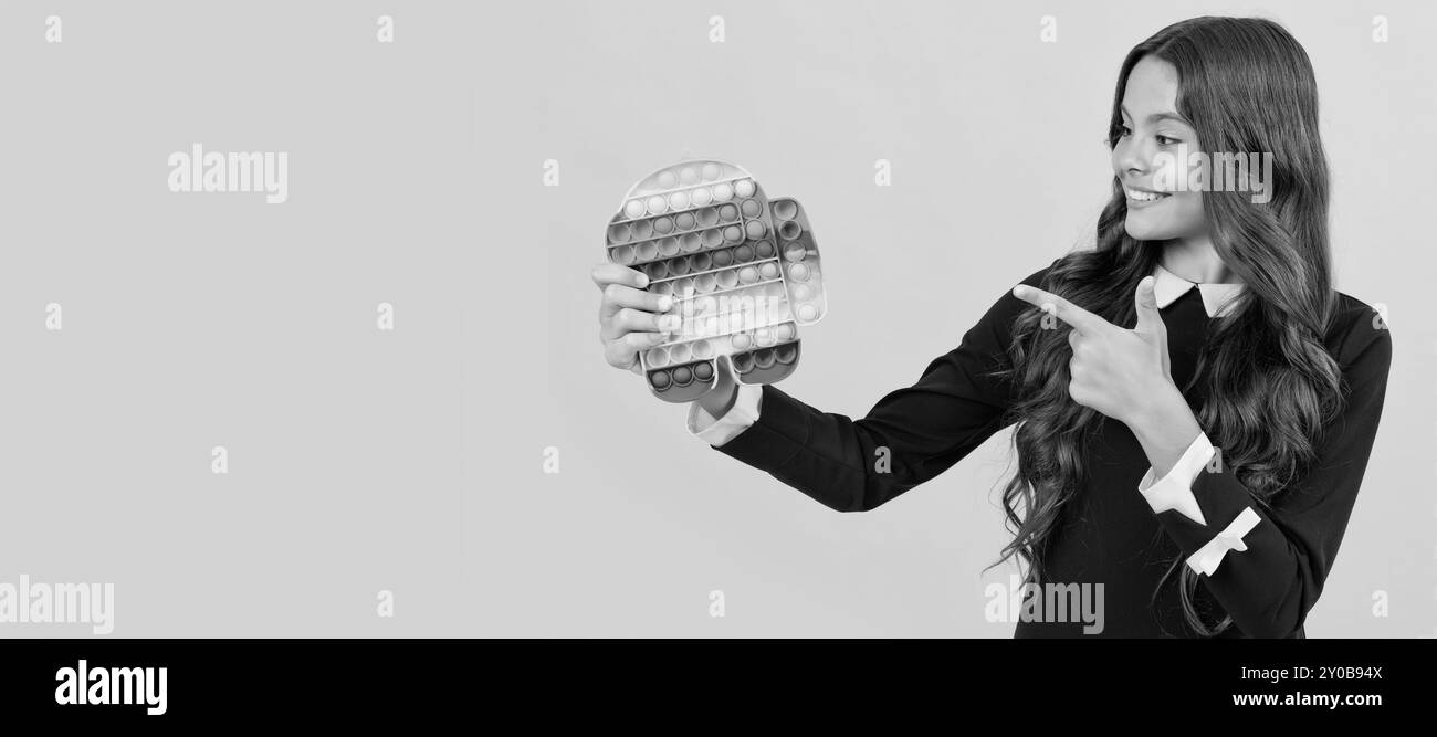 sensory fidgeting. girl with finger game. kid popping anti stress ...