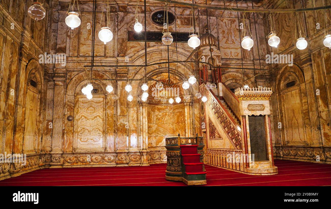 Alabaster clad walls and the Minbar from where prayers are led at the ...