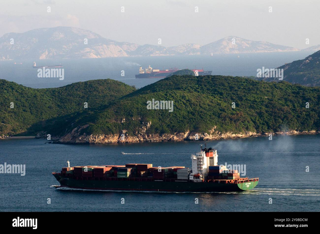 A container ship crossing the East Lamma Chanel in Hong Kong Stock ...