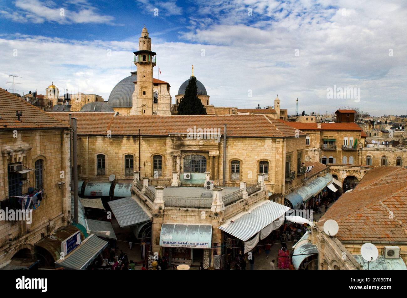 A view of the Omar mosque and the church of the holy Sepulchre behind ...
