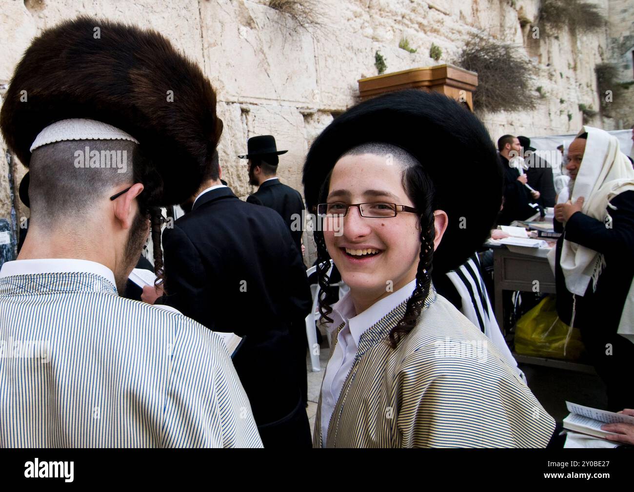 An Orthodox Jewish family dressed up for the Passover holiday. Jewish ...