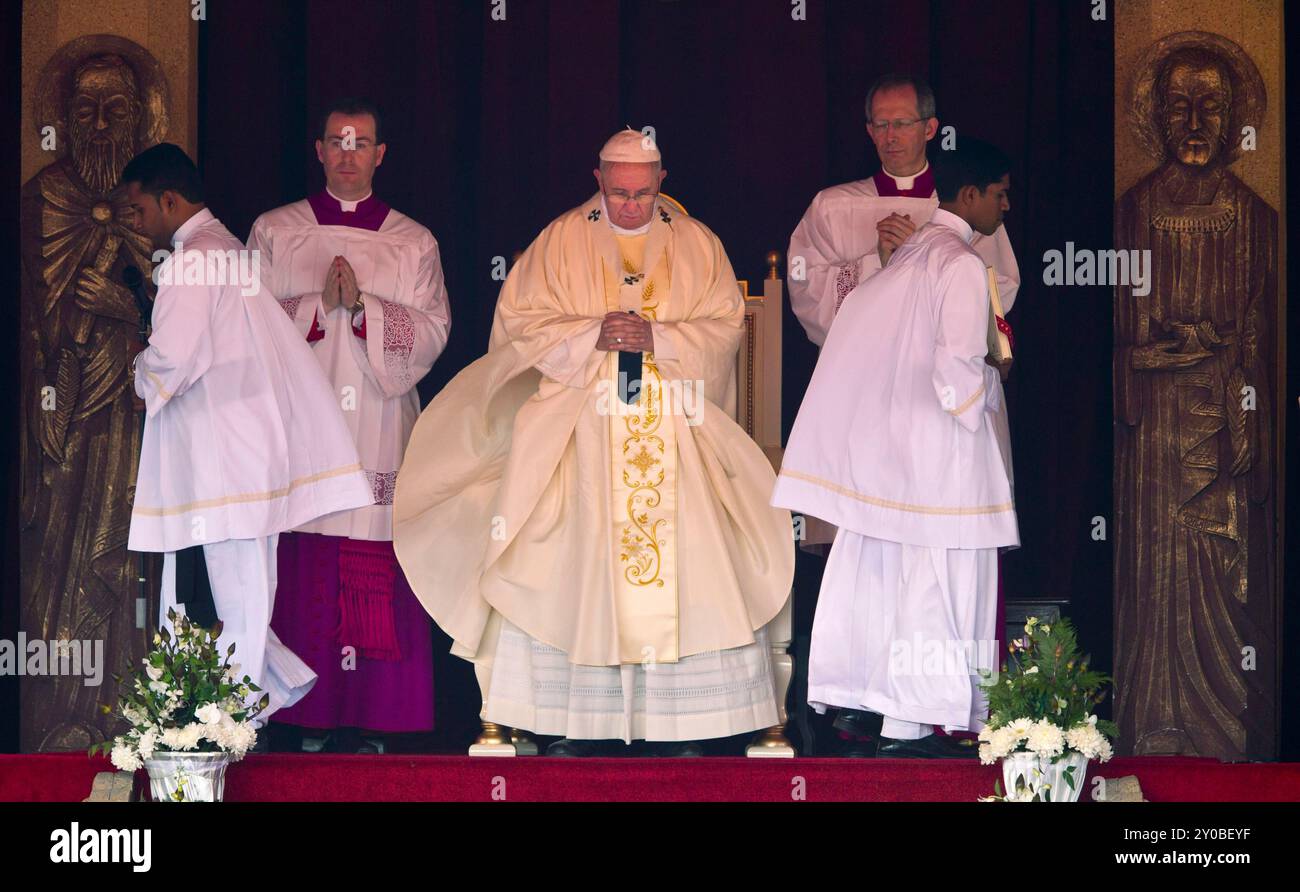 FILE- Pope Francis stands during Mass at Colombo's seafront Galle Face ...