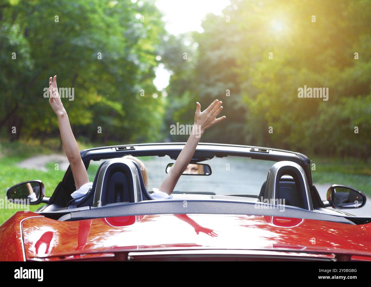 Woman joyfully driving car hi-res stock photography and images - Alamy