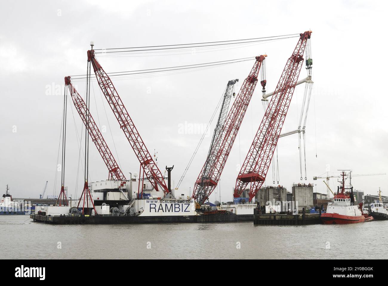 Crane barge Rambiz installing the foundations for the new flood gates ...