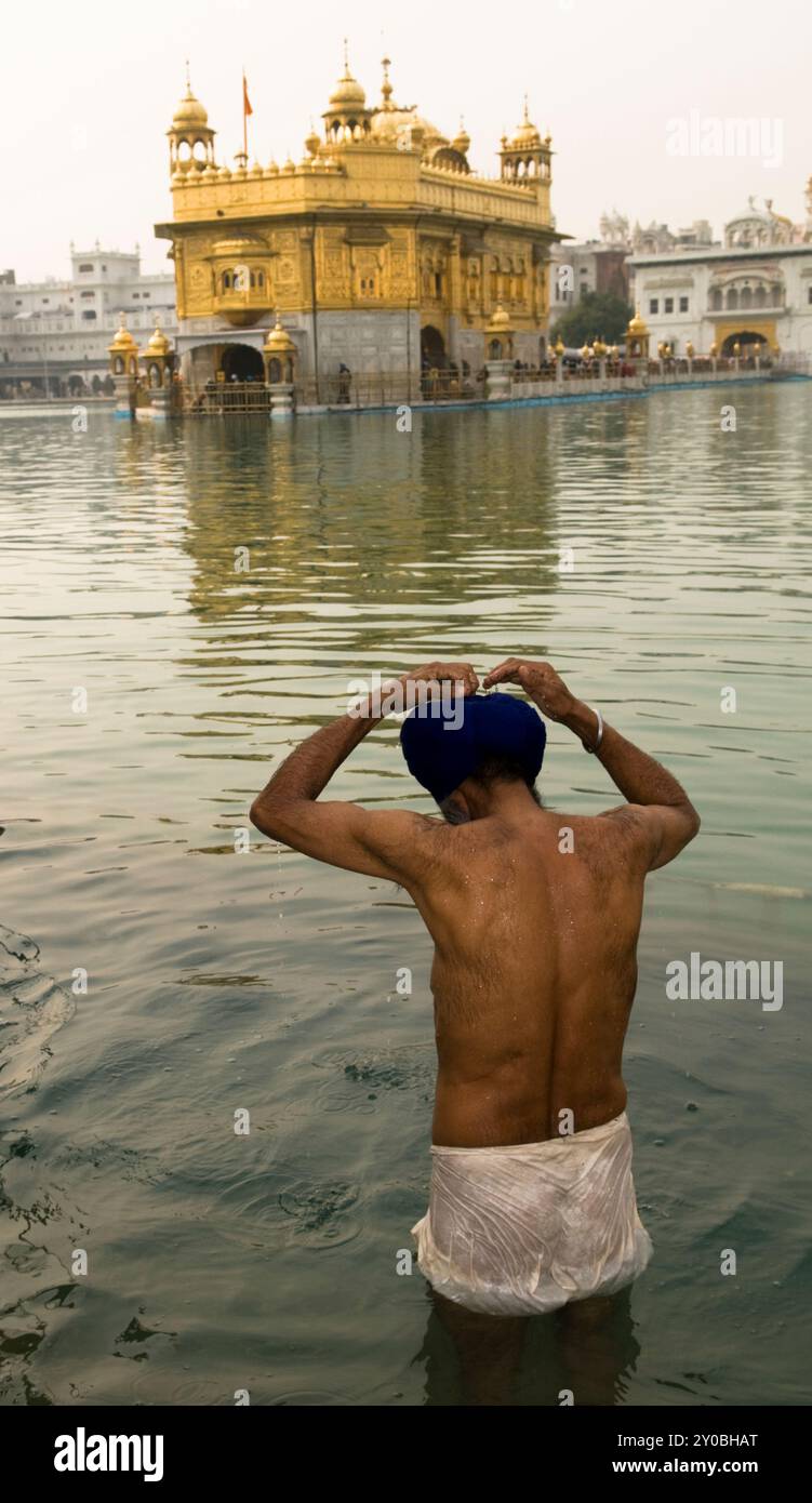 Praying by the Golden temple in Amritsar, Punjab, India Stock Photo - Alamy