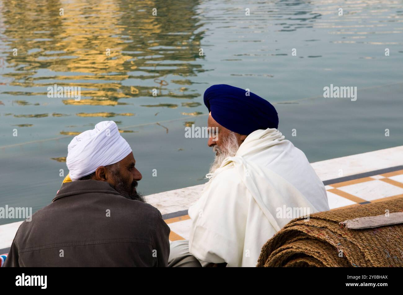 Praying by the Golden temple in Amritsar, Punjab, India Stock Photo - Alamy