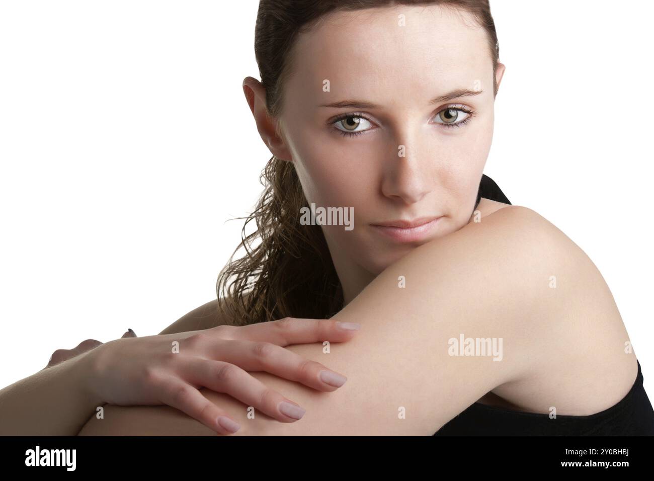 Portrait of an elegant woman looking over her shoulder, isolated in a ...