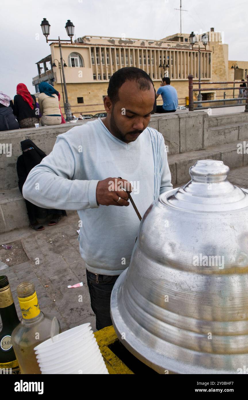 A vendor selling sweets in Alexandria, Egypt Stock Photo - Alamy